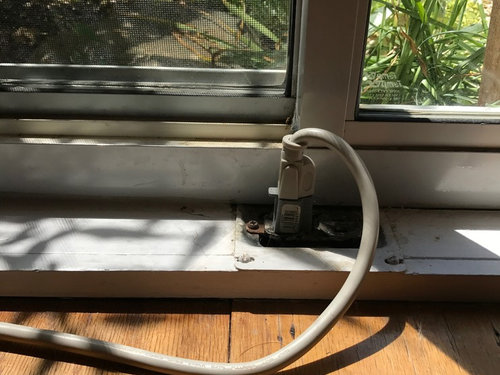 help relocating outlet in floor window frame