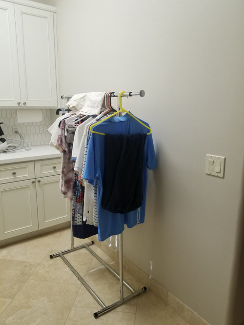 Best hanging system for this laundry room wall?