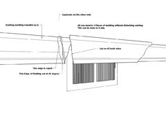 Crown moulding and air vent.