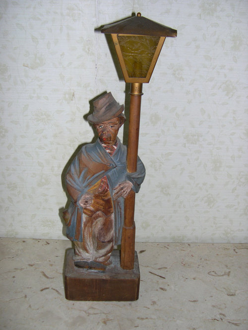 hand carved wood drunk leaning on lamp post music box