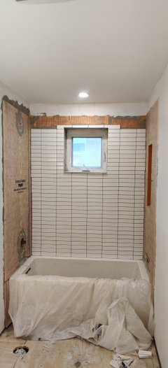 Struggling with 2x8 "stacked" subway tiles. Is this salvageable?