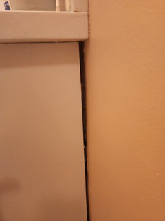 Vanity Trim Against Uneven Wall