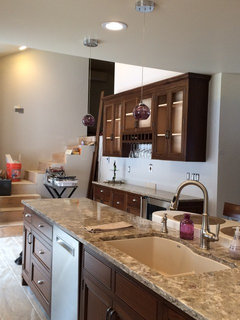 Backsplash and framed focal point above range