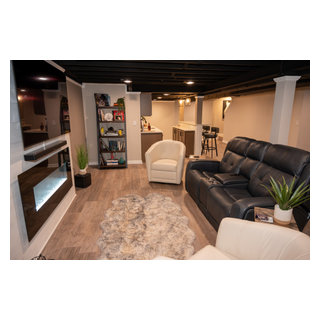 Macomb Finished Basement with a Jam Area - Traditional - Basement ...