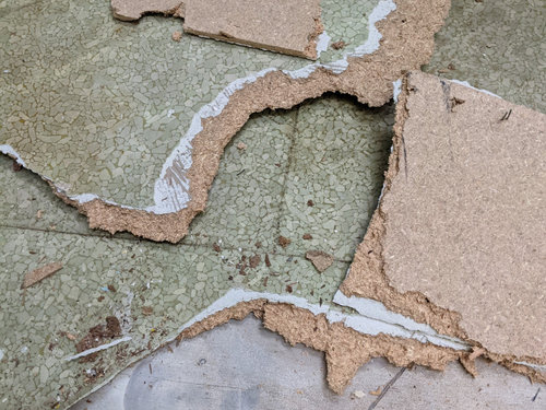 Ripping out old linoleum, the smell is horrendous - maybe dangerous?