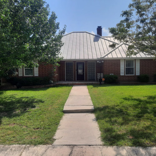 Brick paint color with silver metal roof