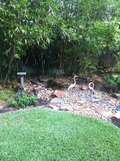 Simple Patio fountain to coexist with tall messy bamboo hedge