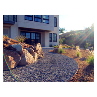 Crushed blue shale pathway with larger boulders and steel edging ...