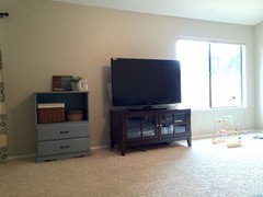 Off center couch in front of window -help?