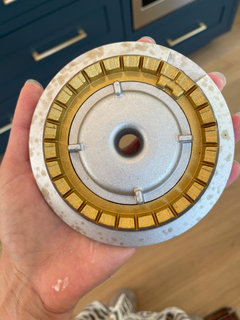 How can I clean GE monogram cooktop?