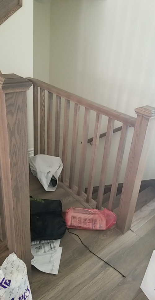 Need help with this awkward space between stairs
