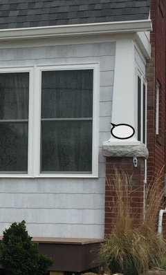 how to attach walls to tapered column in porch enclosure