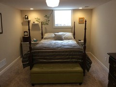 How do I add balance to a wall with an off-center window?