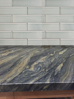 Backsplash recommendations for black fantasy leathered granite?