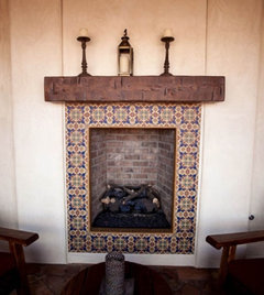 plaster/stucco fireplace surround, adding tiles