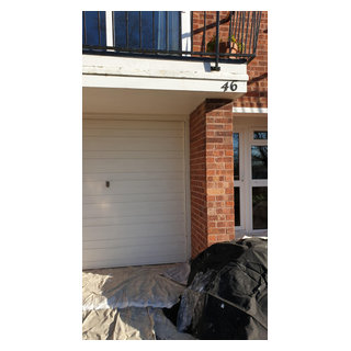 Front exterior - garage door, hand rail, and railing in West Wimbledon ...