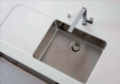 Drain runnels carved into quartz countertop?