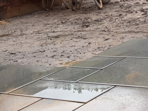 normal to have area where puddles collect on paver patio