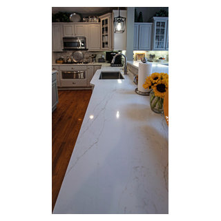 Painted Cabinetry with LaVenta Snow Drift Quartz and Travertine-Look ...