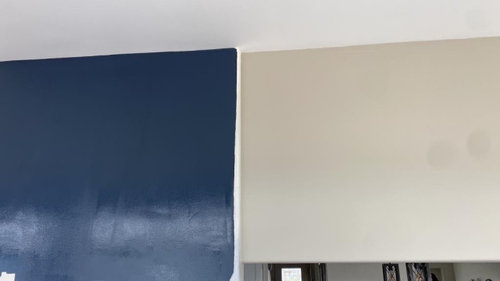 How to split paint colors between two rooms that share an open doorway