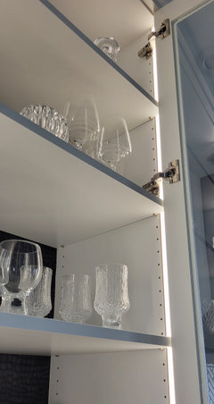 Best lighting method for glass panel display cabinet? Where to place?