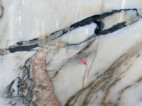 Cracks vs fissures in marble