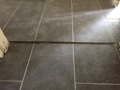 Different height floor tile