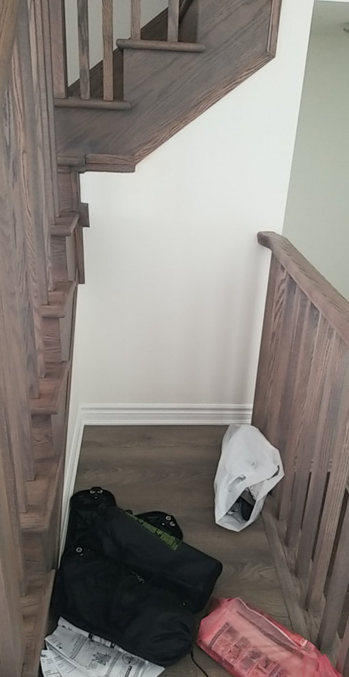 Need help with this awkward space between stairs
