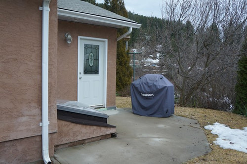 Need help hiding egress window on Patio