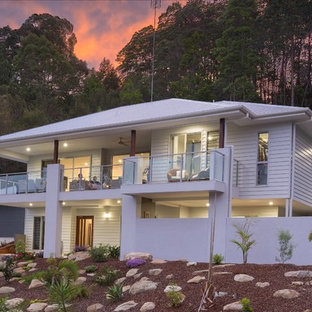 75 Beautiful Tropical Split-Level Exterior Home Pictures & Ideas | Houzz