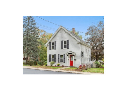 How to downplay 2nd floor asymmetric window placement?