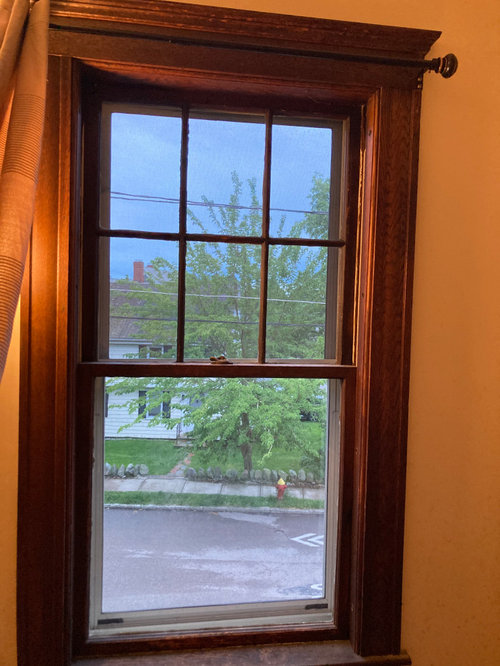 Almond vinyl windows / dark brown trim