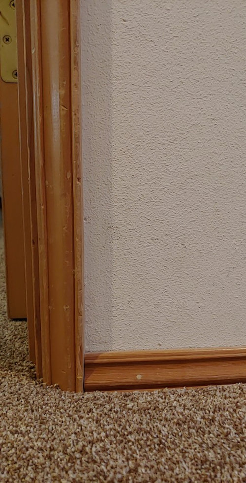 New baseboard moulding with old door casing