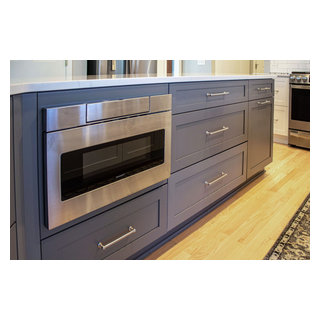 Siteline White Kitchen with Gray Island and Calacatta Miraggio Quartz ...