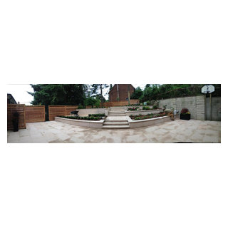 Terraced Backyard - natural stone patio, deck for seating, terraced ...