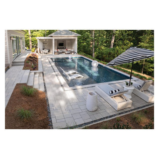 Traditional Pool Patio with Grey Pavers and A Cobblestone Inlay ...