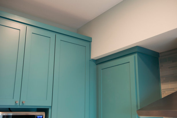 Blue and Aqua Cabinets Make a Splash in a Colorful Kitchen