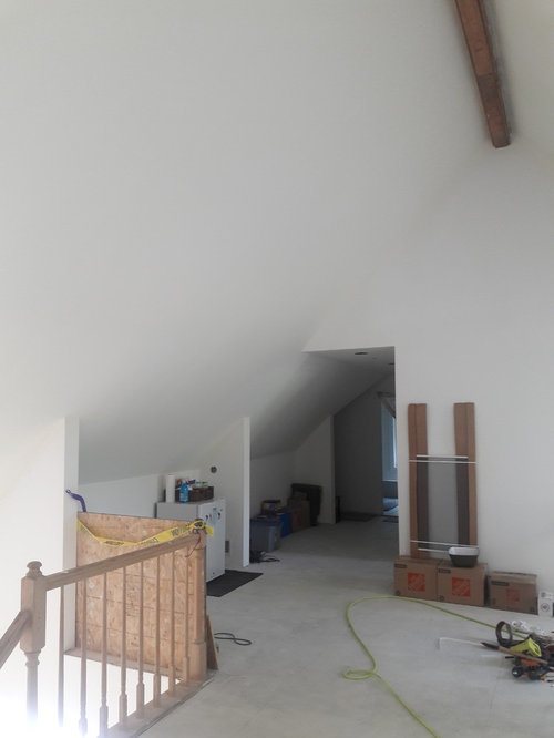 Beams on one side of sloped ceiling?