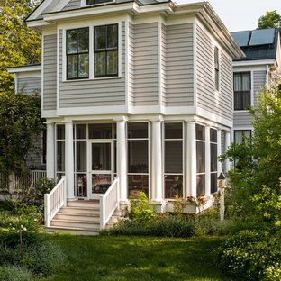 75 Beautiful Traditional Exterior Home With A Clipped Gable Roof ...