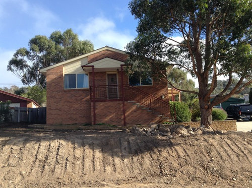 Help! Any ideas on changing the Front of this house to make it modern