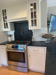 help with backsplash behind range! slab or tile?