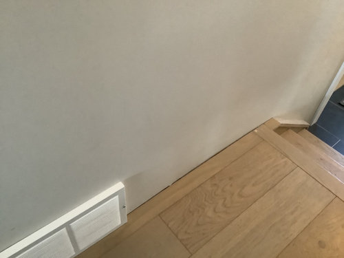 How should we transition the baseboards, and stairs here?