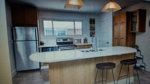 Range hood in front of window