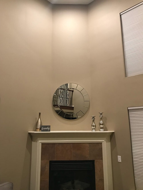Help design a model home fireplace