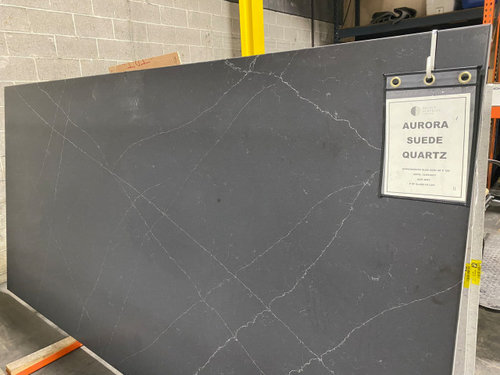 Does anyone have Aurora Suede Quartz countertops in their kitchen?