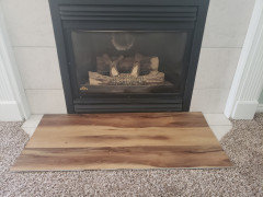 LVP flooring next to gas fireplace?