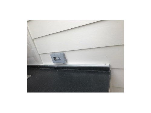 Preventing water intrusion in outdoor summer kitchen