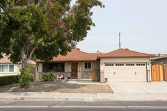 Help with curb appeal for this charmless 1980s ranch