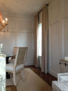 Need help on what to put on walls between windows..