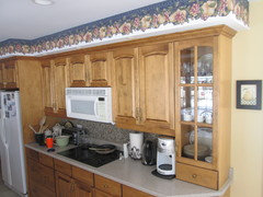 What to do with the headers over my kitchen cabinets?